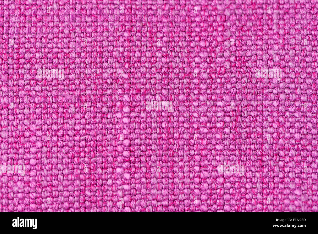 Closeup detail of pink fabric texture background Stock Photo - Alamy