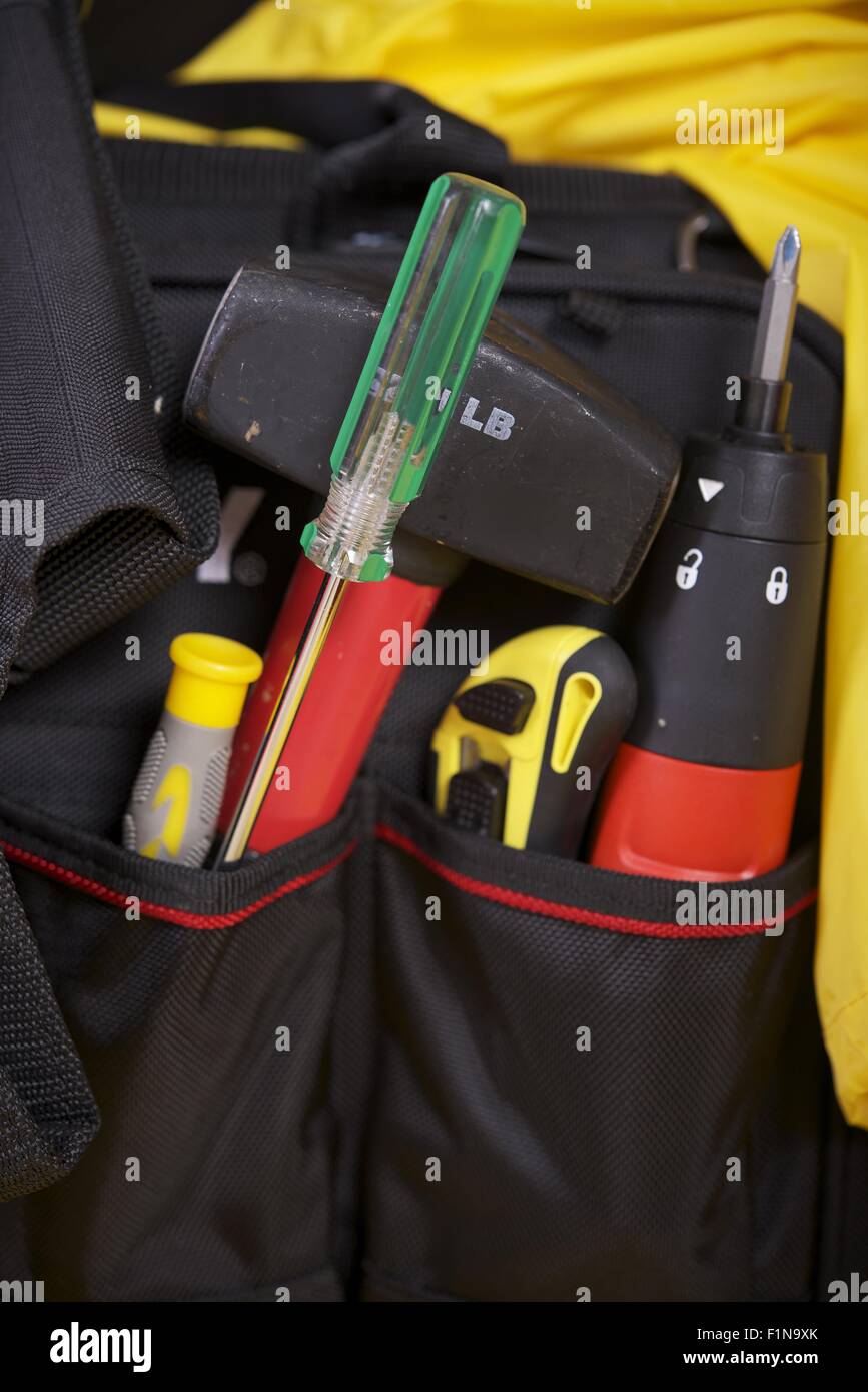 Construction Tools in Contractor Bag Vertical Photo Stock Photo - Alamy