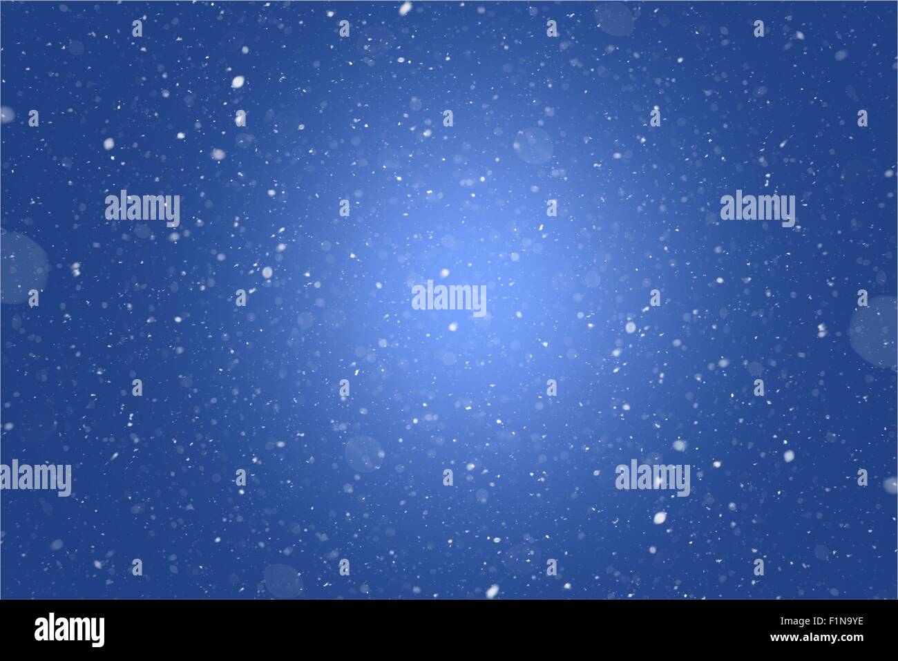 Real Snow Falling on Blue Background Stock Photo - Alamy
