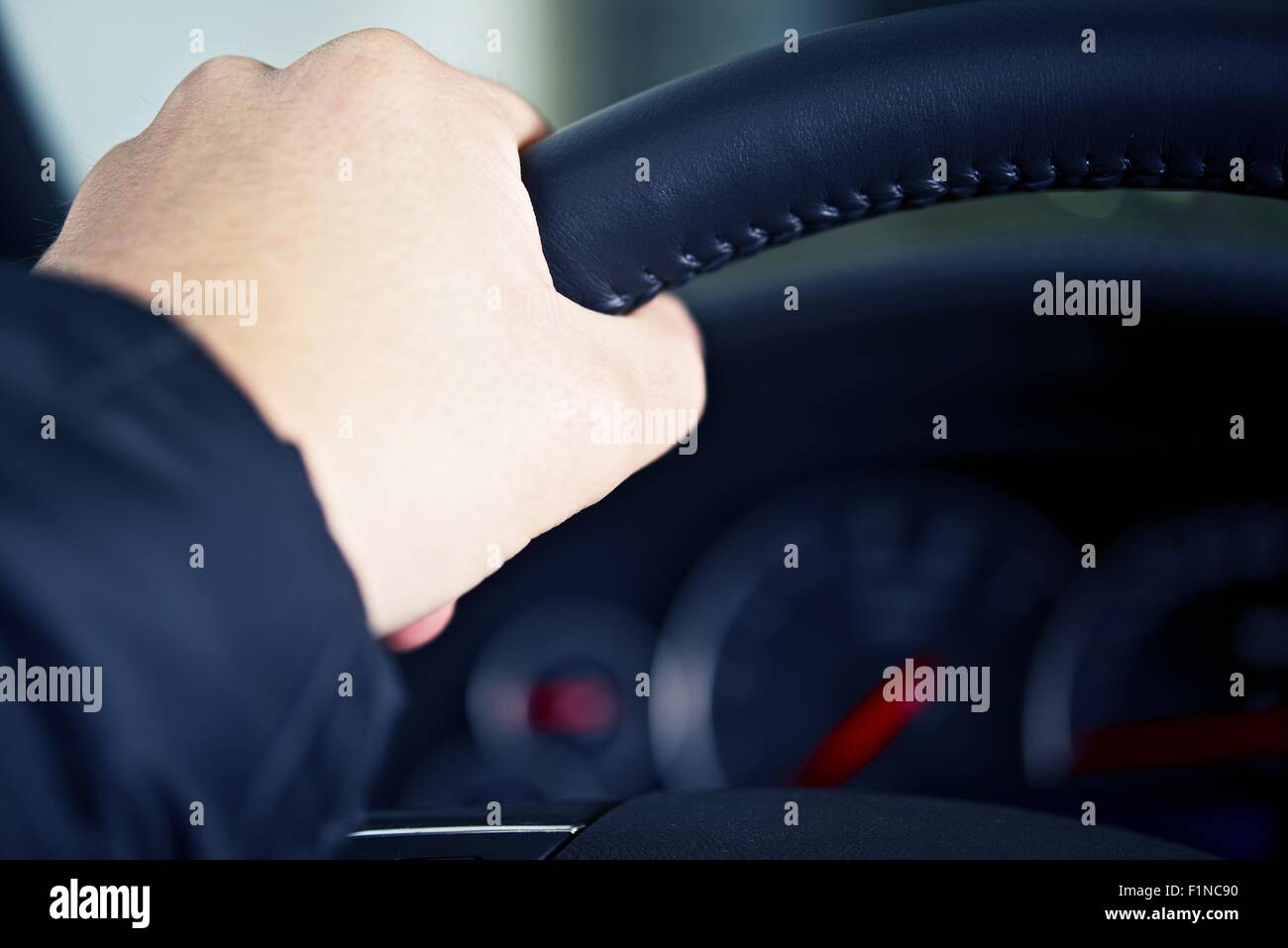 Men Left Hand on Car Steering Wheel. Driving Theme. Transportation ...