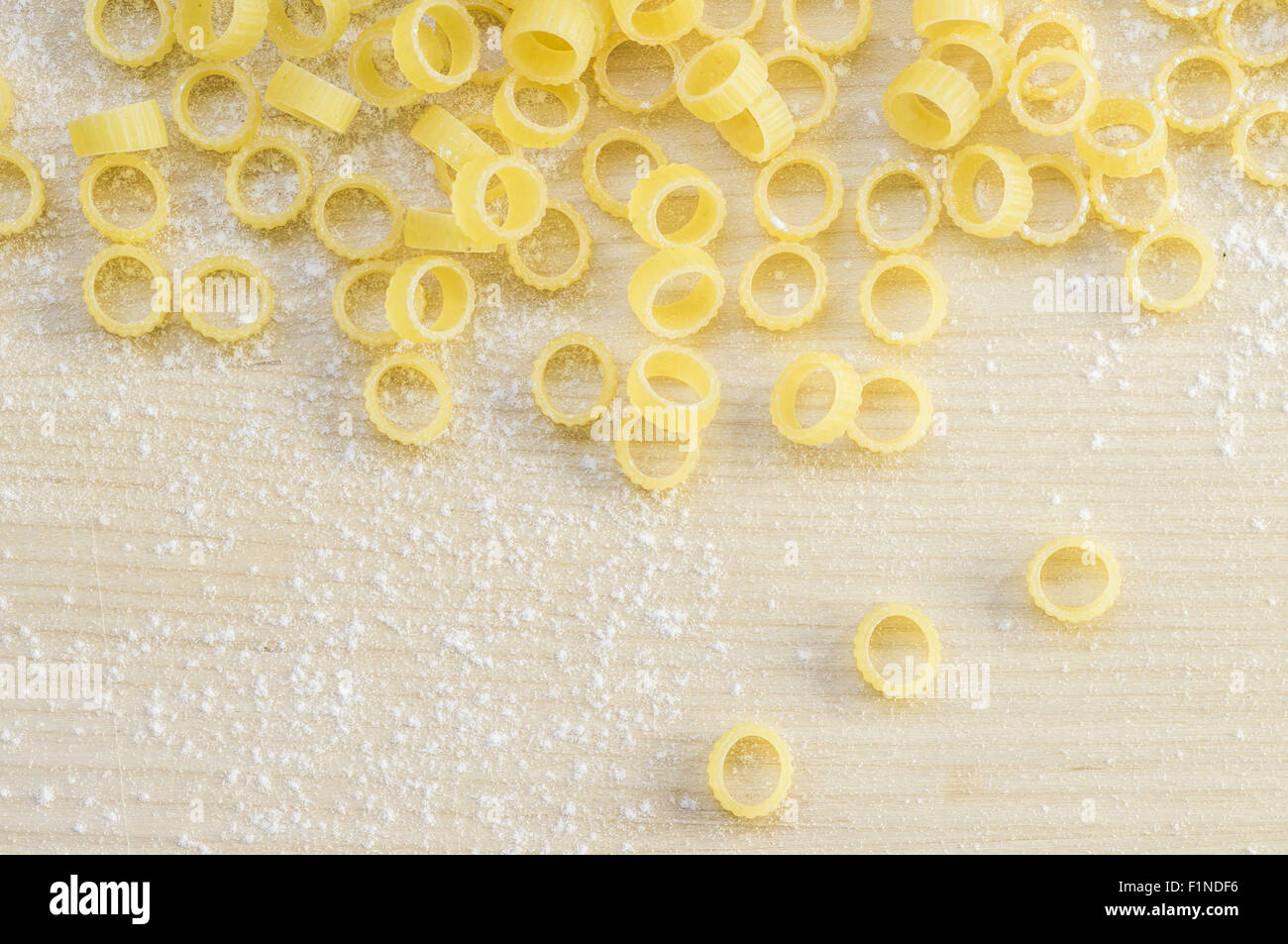 Anellini pasta rings on the table top view Stock Photo - Alamy