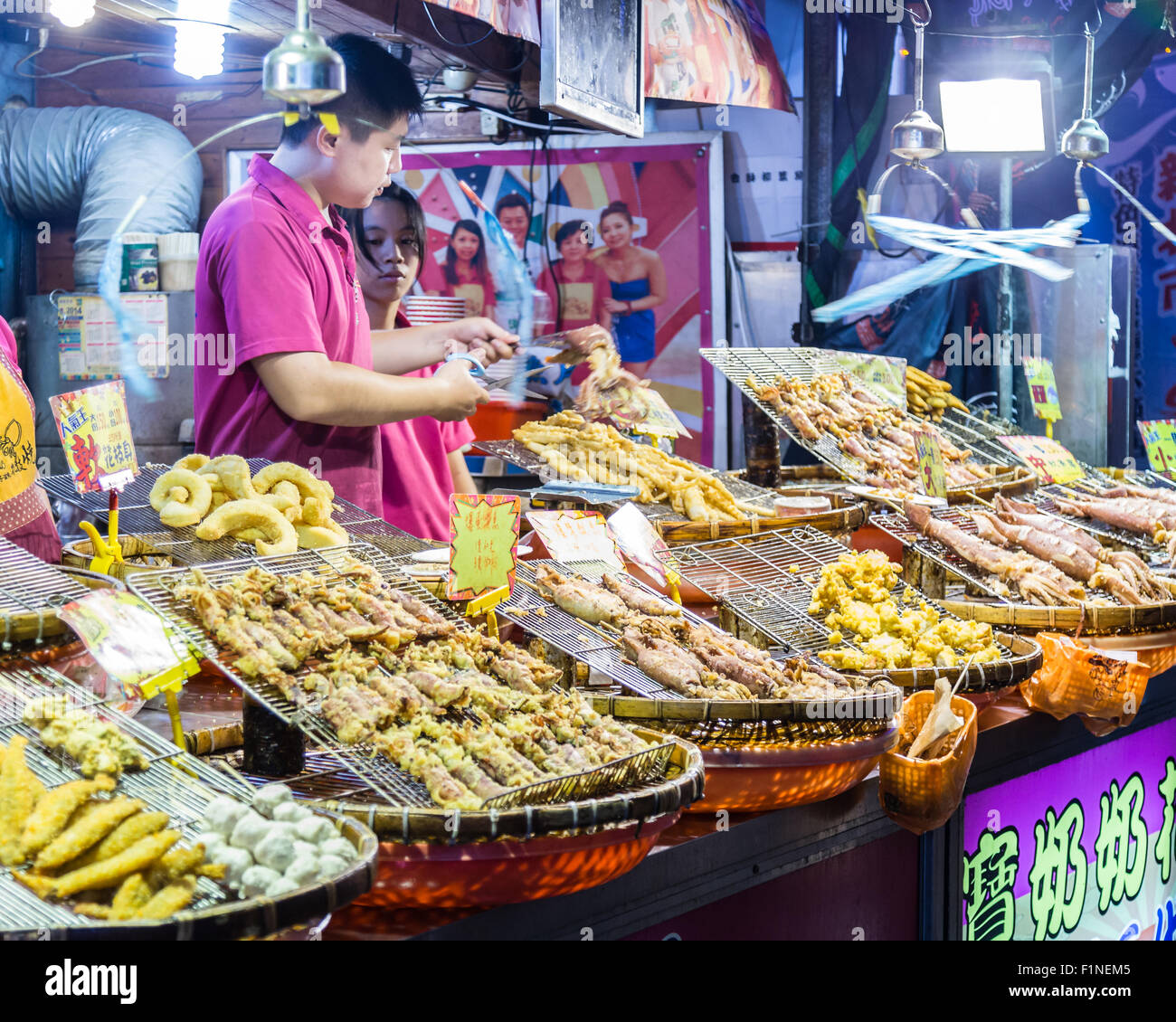 NEW TAIPEI CITY, TAIWAN - AUGUST 30, 2015: Food vendors at traditional ...