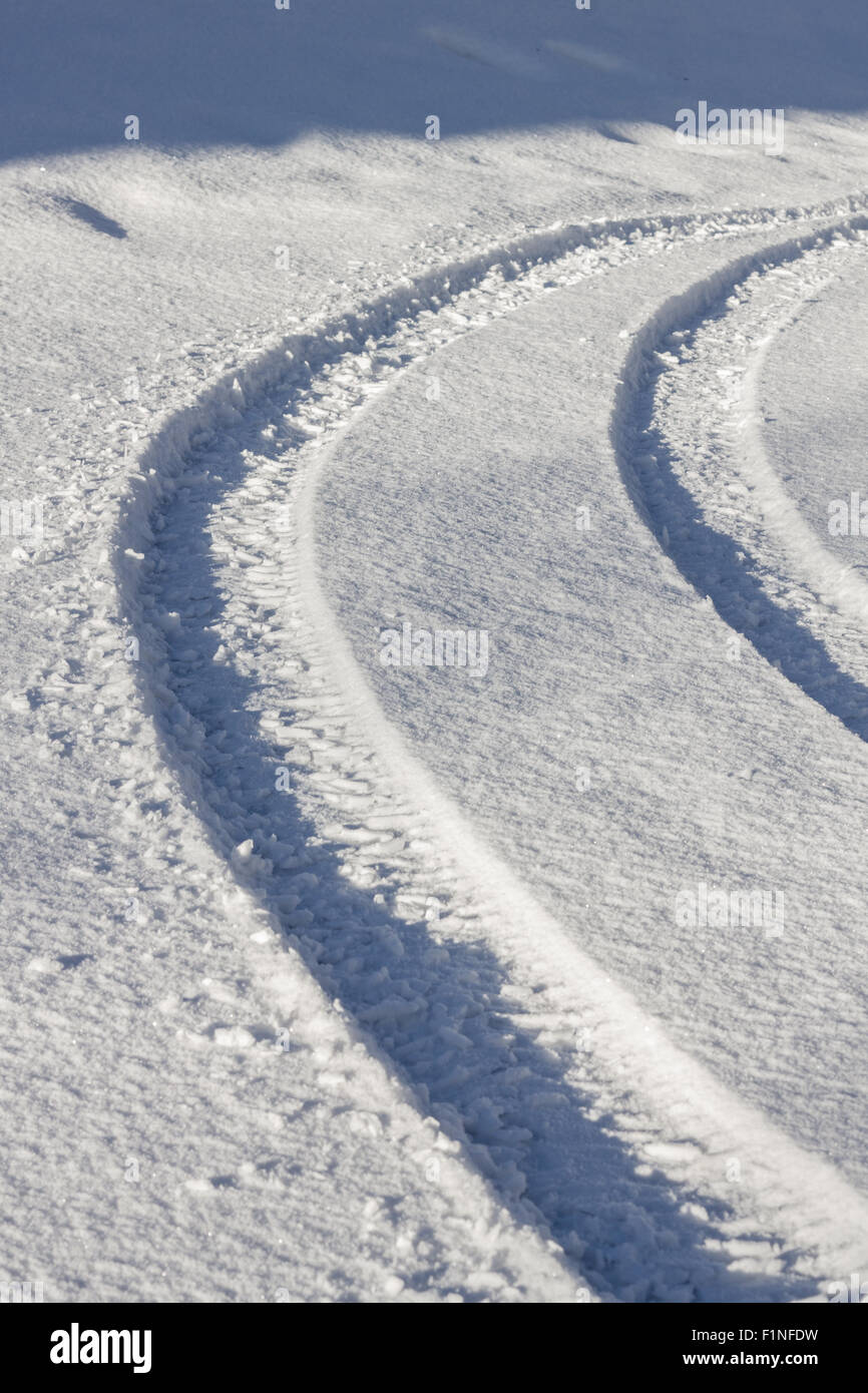 Tire tracks on a fresh snow Stock Photo - Alamy