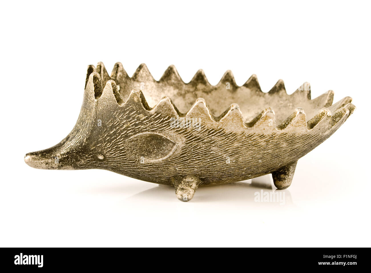Iron dish of hedgehog isolated on white Stock Photo - Alamy
