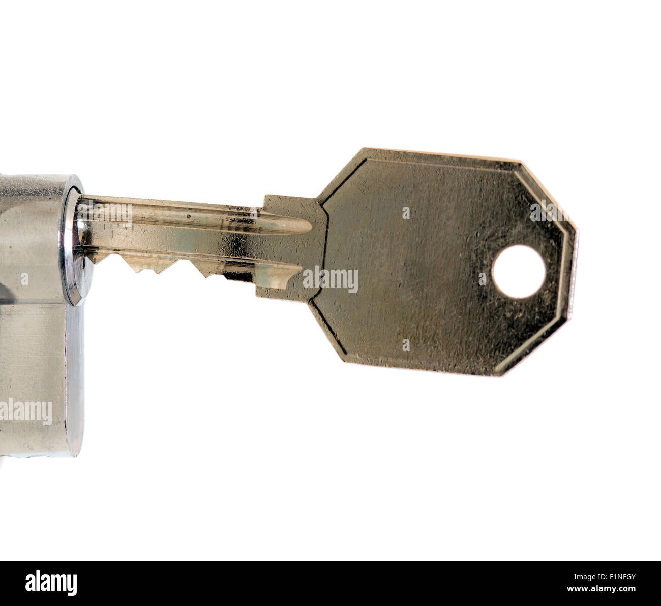 Key inserted into the keyhole Stock Photo - Alamy