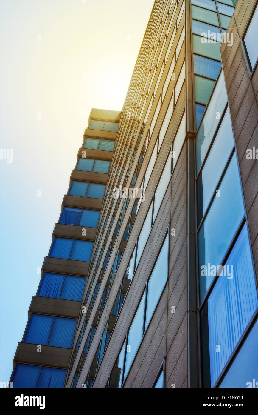 Sun shining at the business building Stock Photo - Alamy