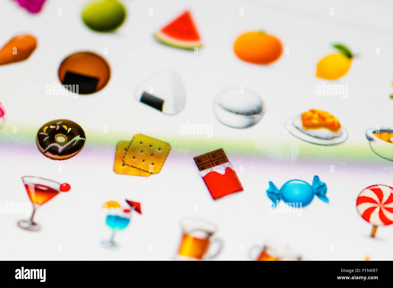 Screen displaying a range of food emojis Stock Photo - Alamy