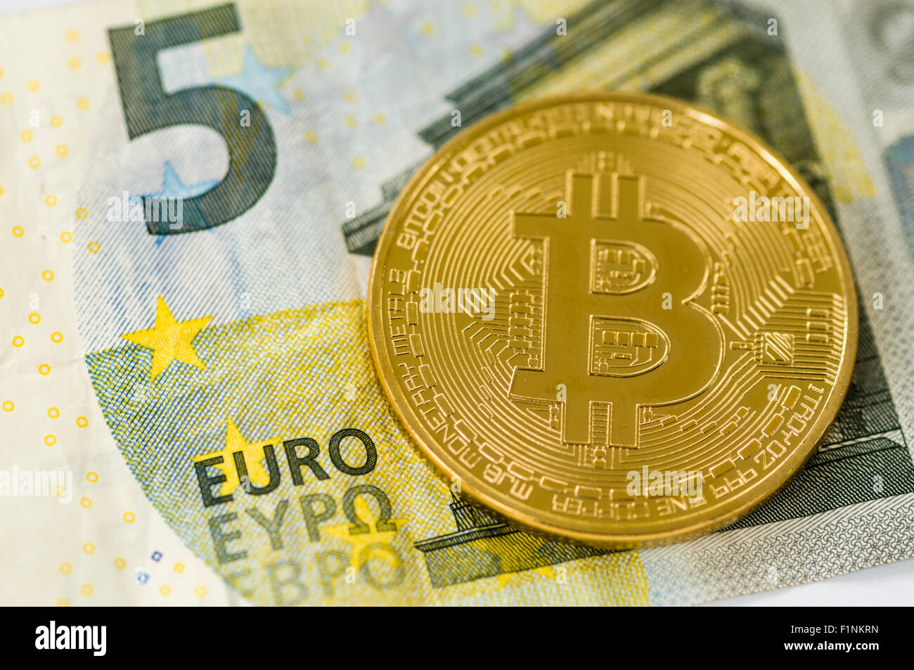 Bitcoin on a €5 five Euro banknote Stock Photo - Alamy
