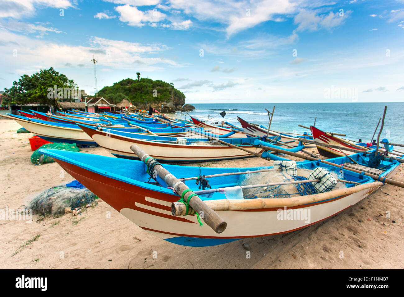 Traditional fishing boats on Drini beach on Java, Indonesia Stock Photo ...