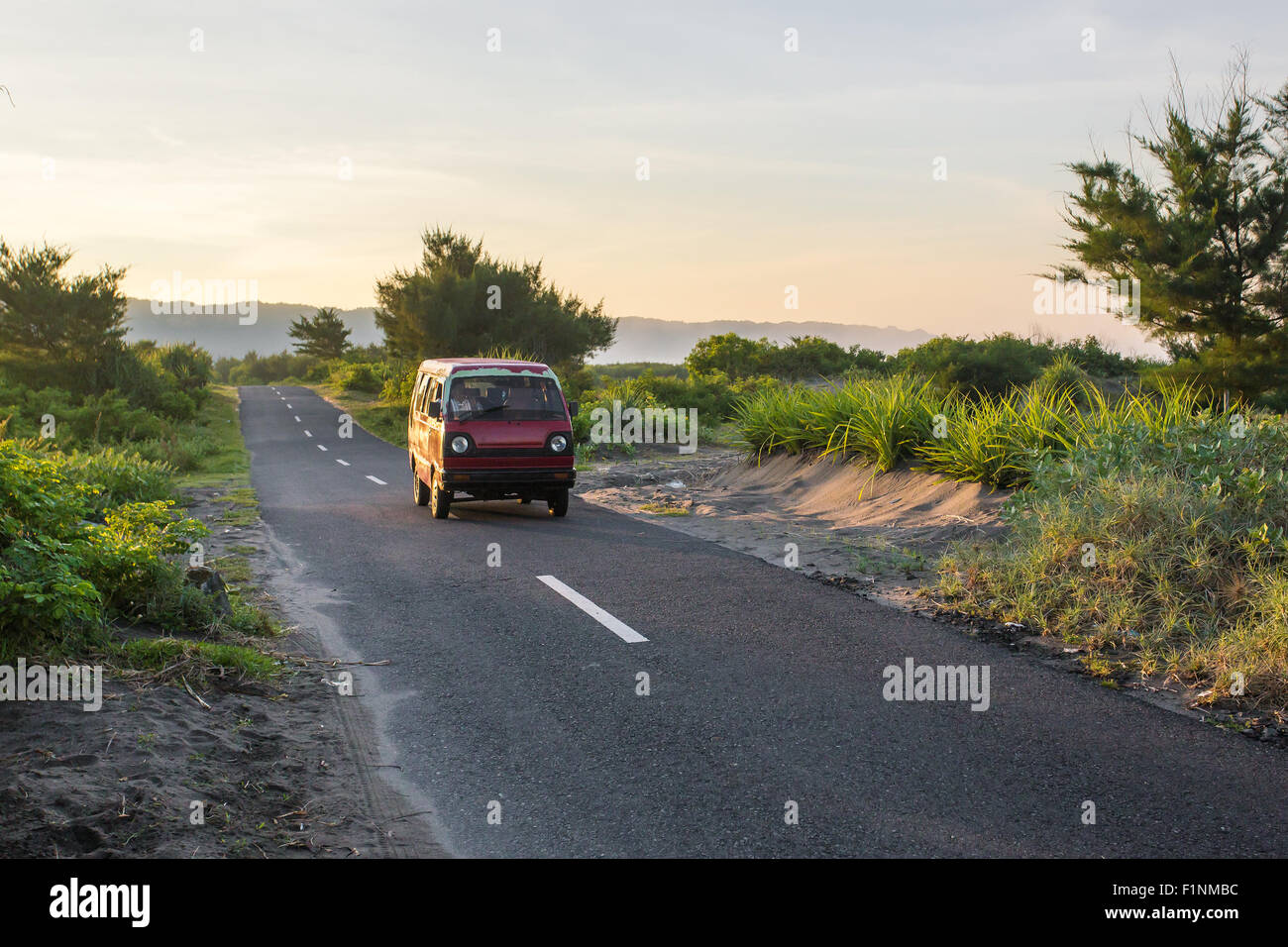 Car on the rural sunny road Stock Photo - Alamy