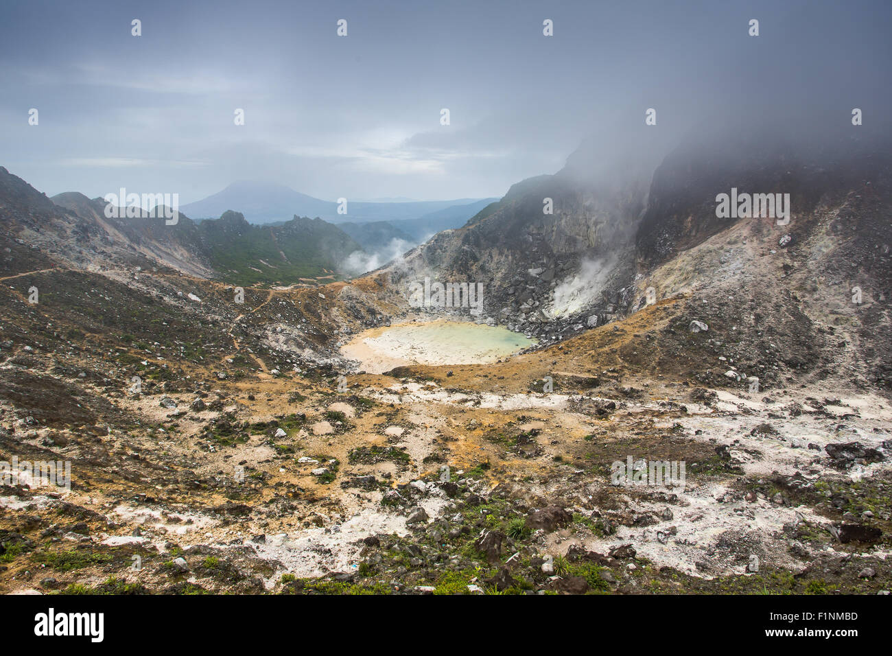 Sibayak volcano near Berastagi in northern Sumatra, Indonesia. Cloudy ...