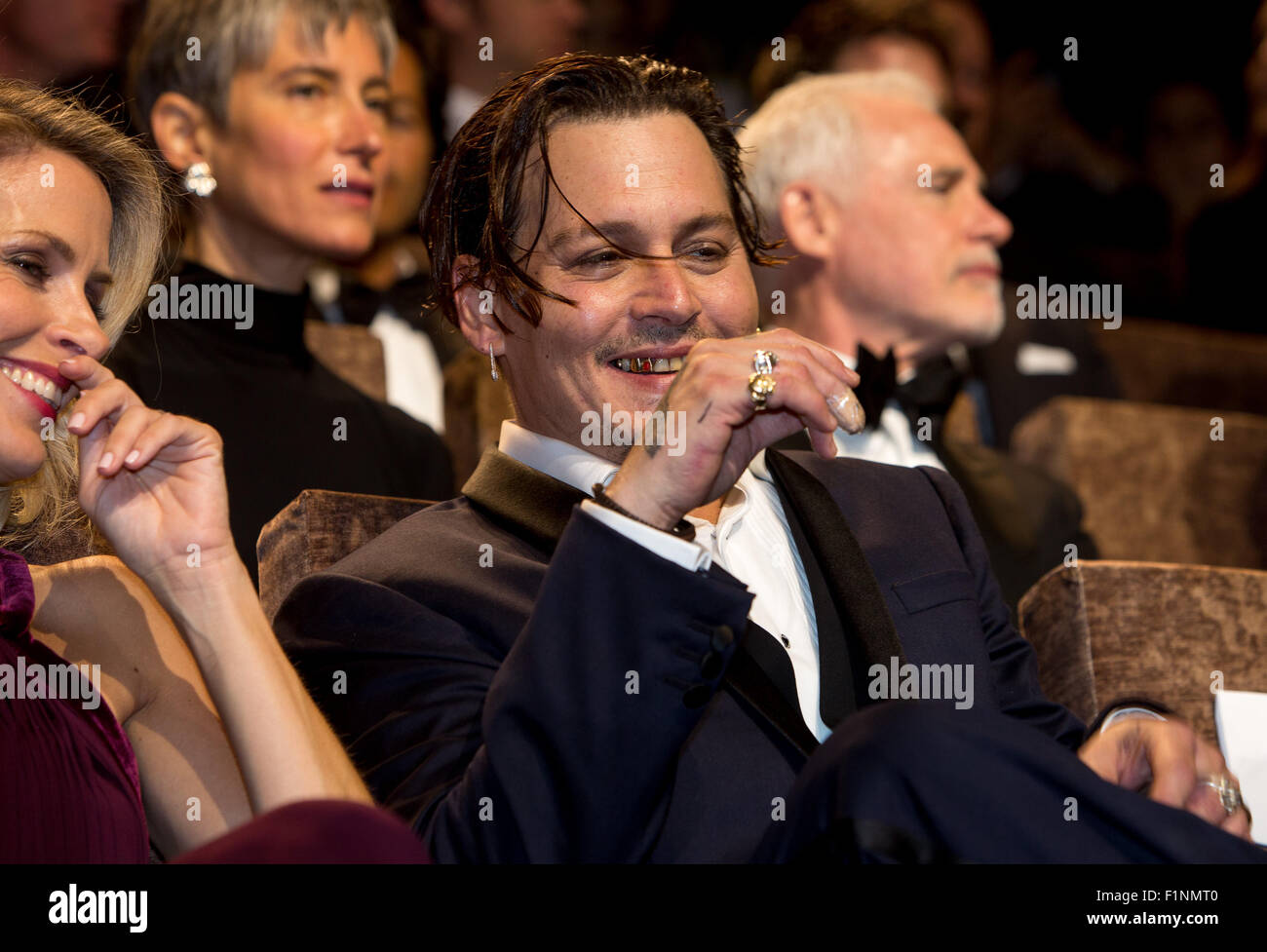 Actor Johnny Depp and Jocelyn Cooper attend the premiere of Black Mass ...
