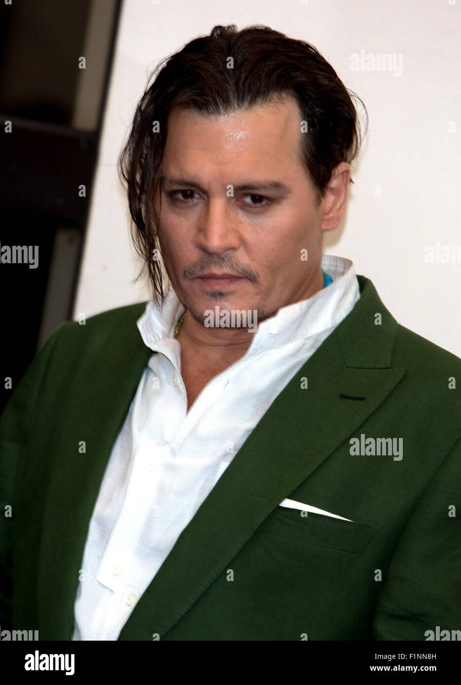 Venice, Italy. 04th Sep, 2015. US actor Johnny Depp poses at the ...