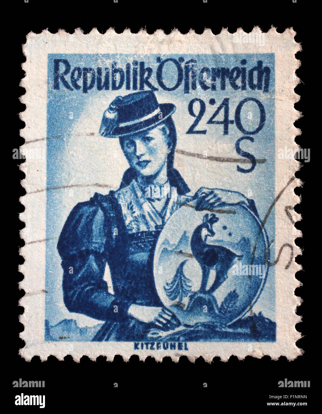 Stamp printed in Austria shows image woman in national Austrian ...