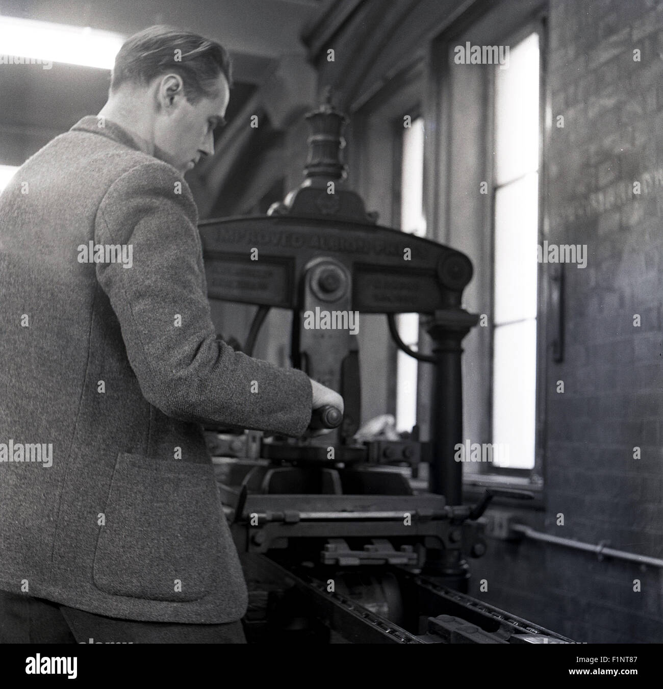 1950s, historical, man using a mechanical Stock Photo - Alamy