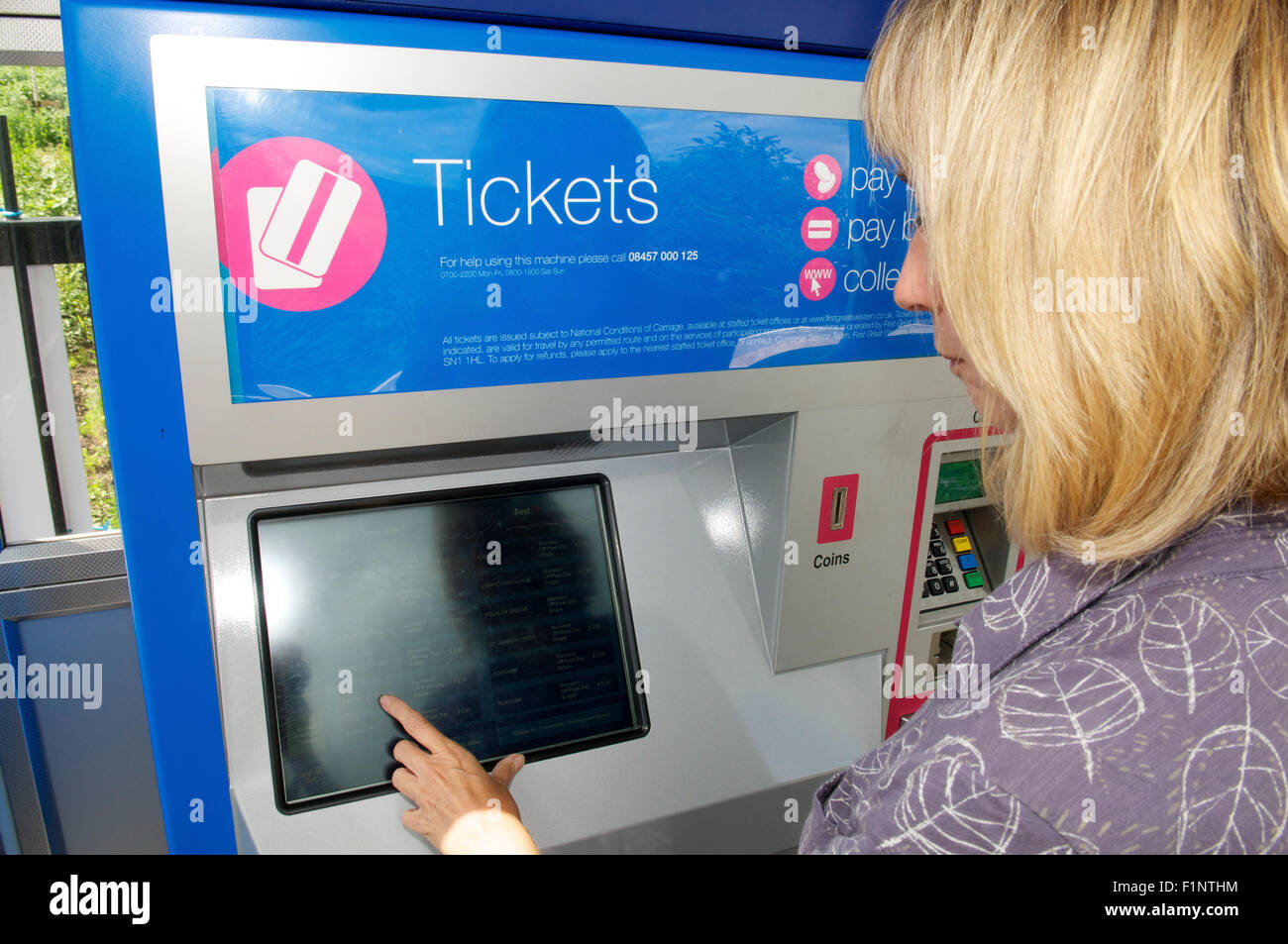 Buying the ticket hi-res stock photography and images - Alamy