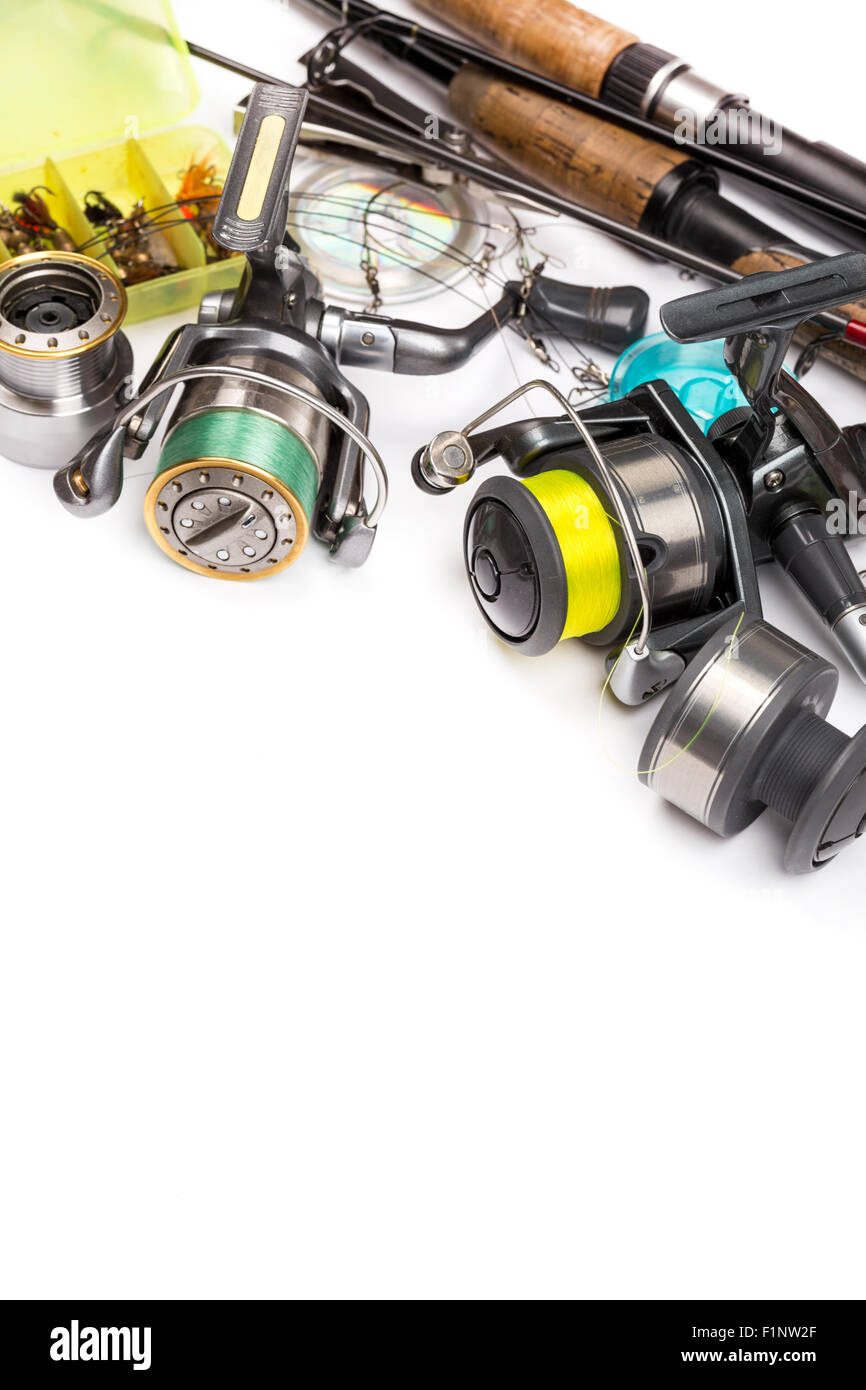 top different fishing tackles - rod, reel, line and lures on white ...