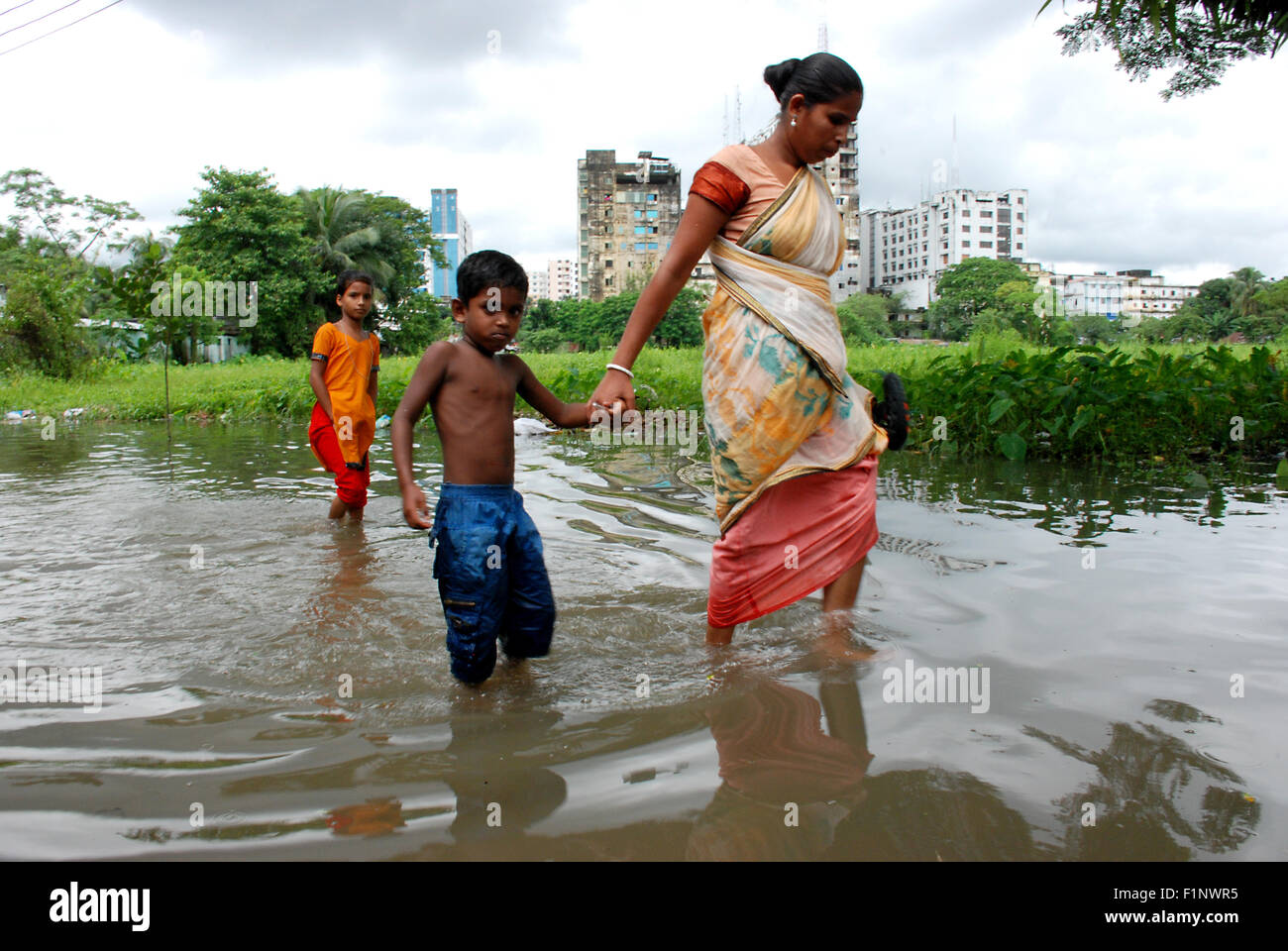 The flood-affected people suffering their everyday life flood water in ...