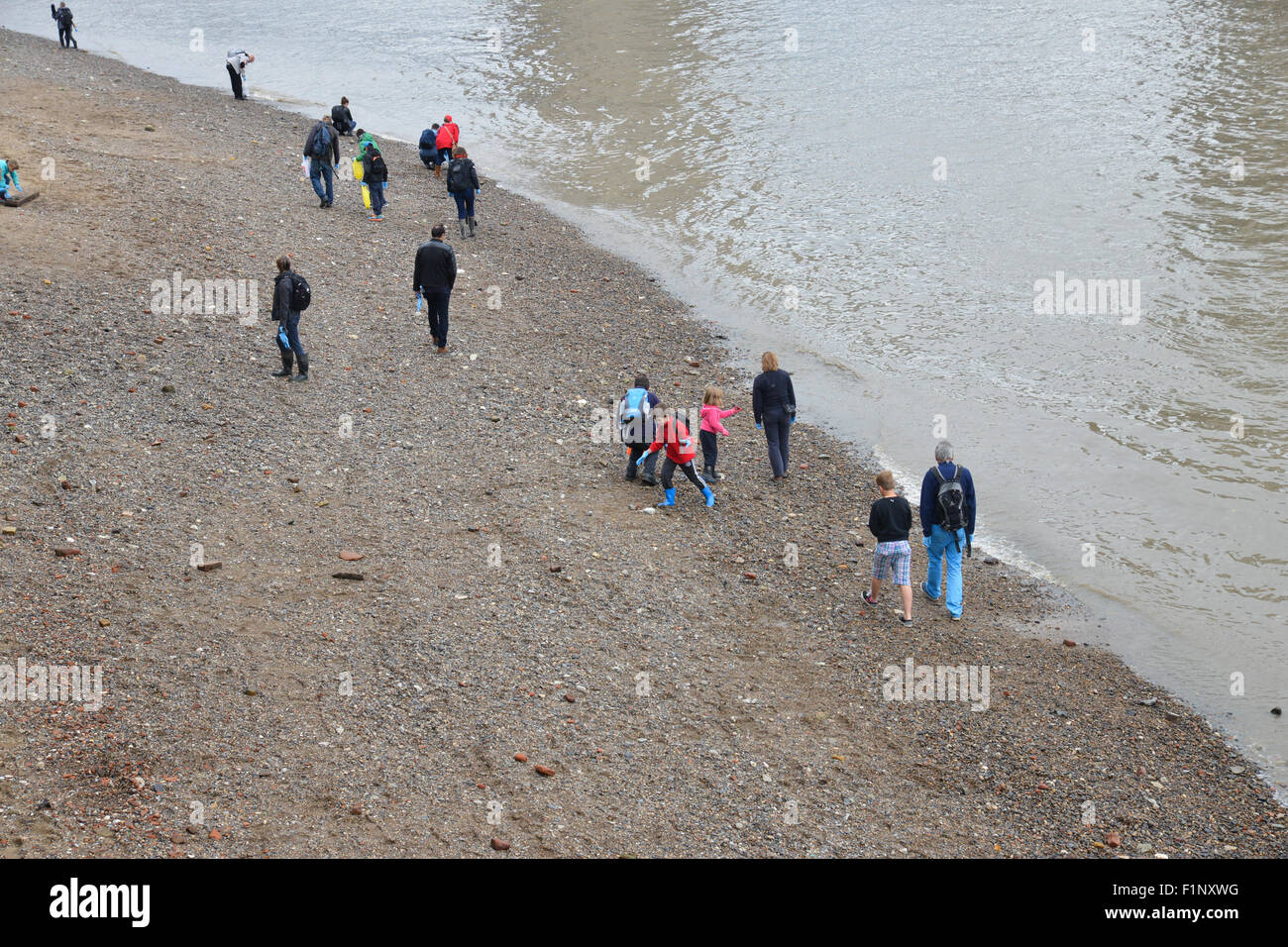 Members of the public explore the Tower Beach next to the Tower of ...