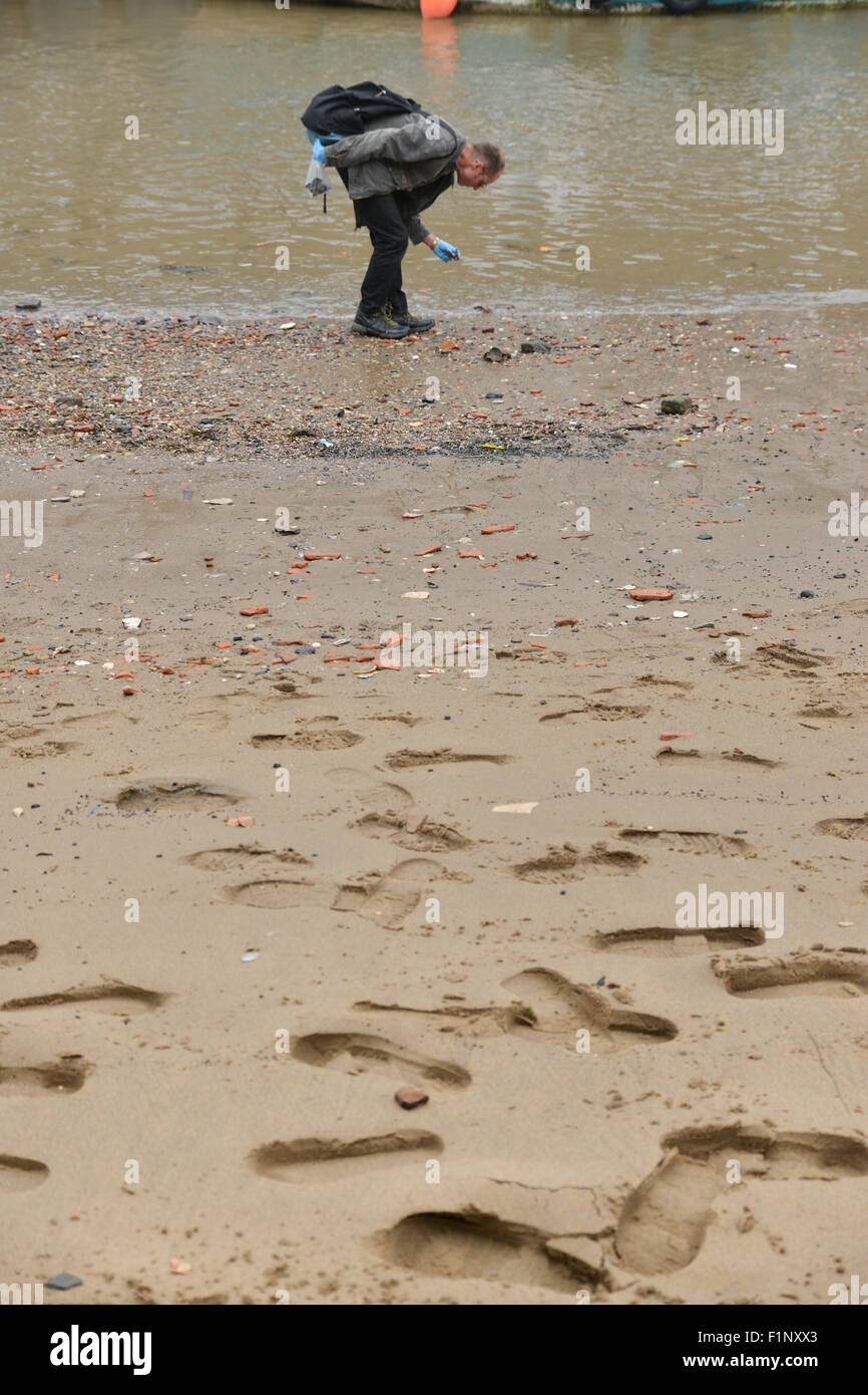 Members of the public explore the Tower Beach next to the Tower of ...