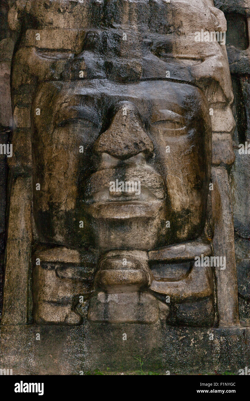 Close up of an Olmec style face that adorns the side of the Mask Temple ...
