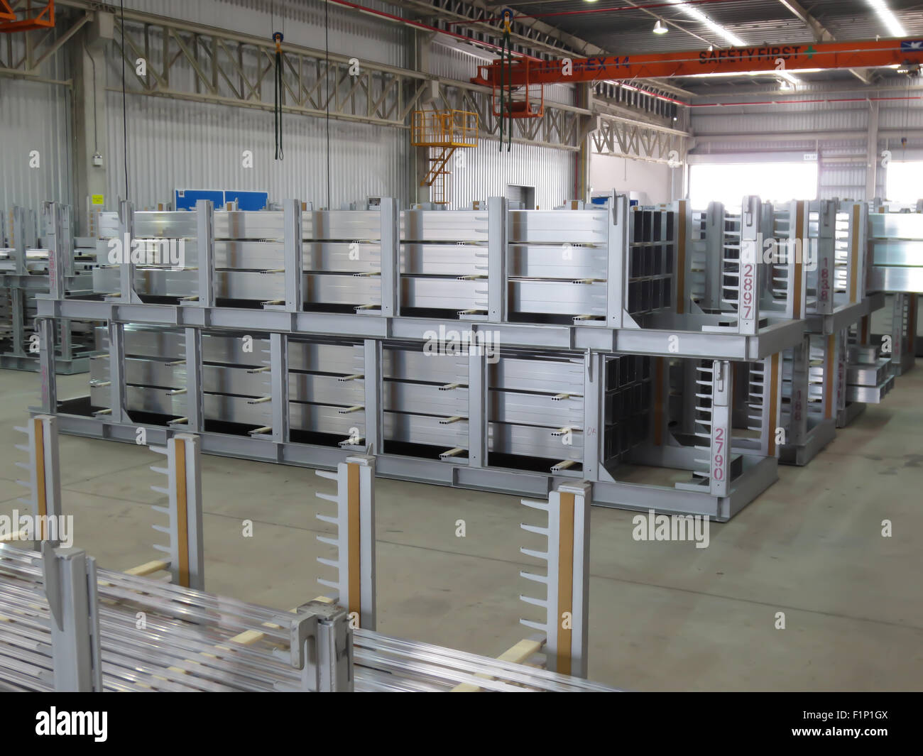Aluminum lines stock rack in a factory Stock Photo - Alamy