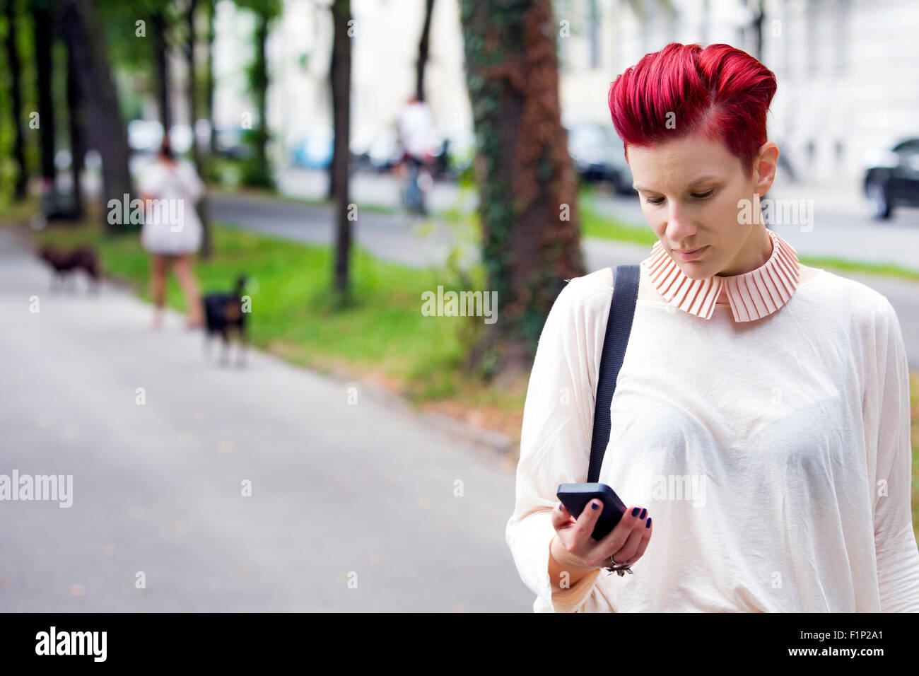 Redhead woman red telephone hi-res stock photography and images - Alamy