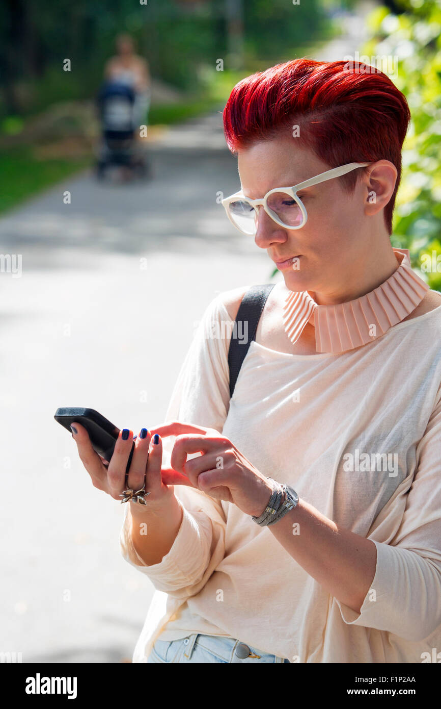 Redhead woman red telephone hi-res stock photography and images - Alamy