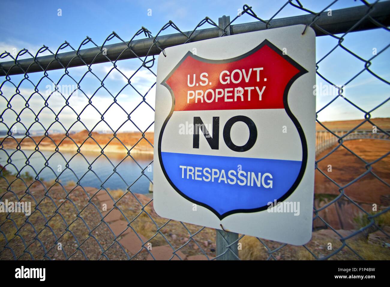 No Trespassing US Government Property Warning Sign on Fence Stock Photo ...