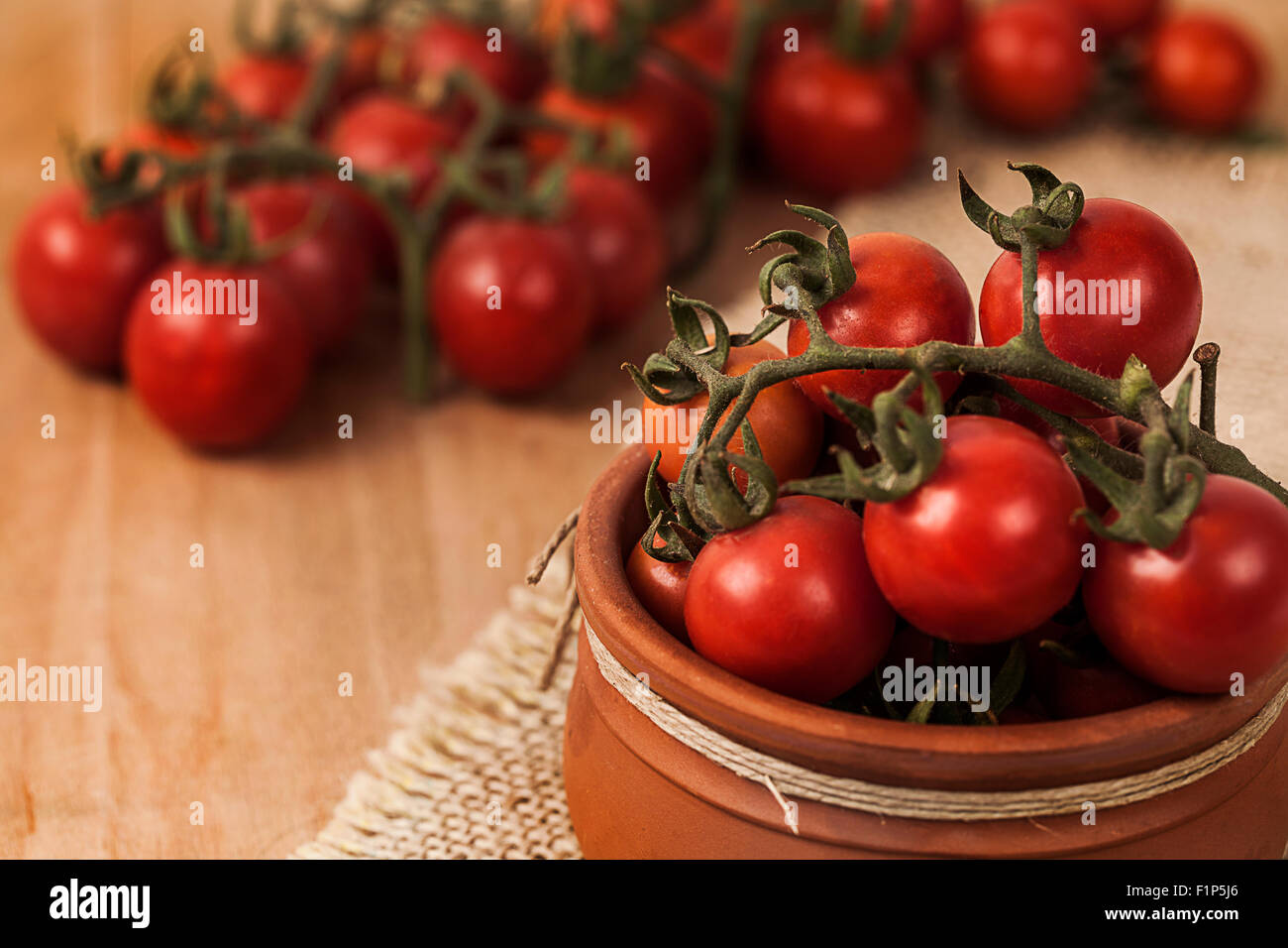 Cherry tomato in ceramic hi-res stock photography and images - Alamy