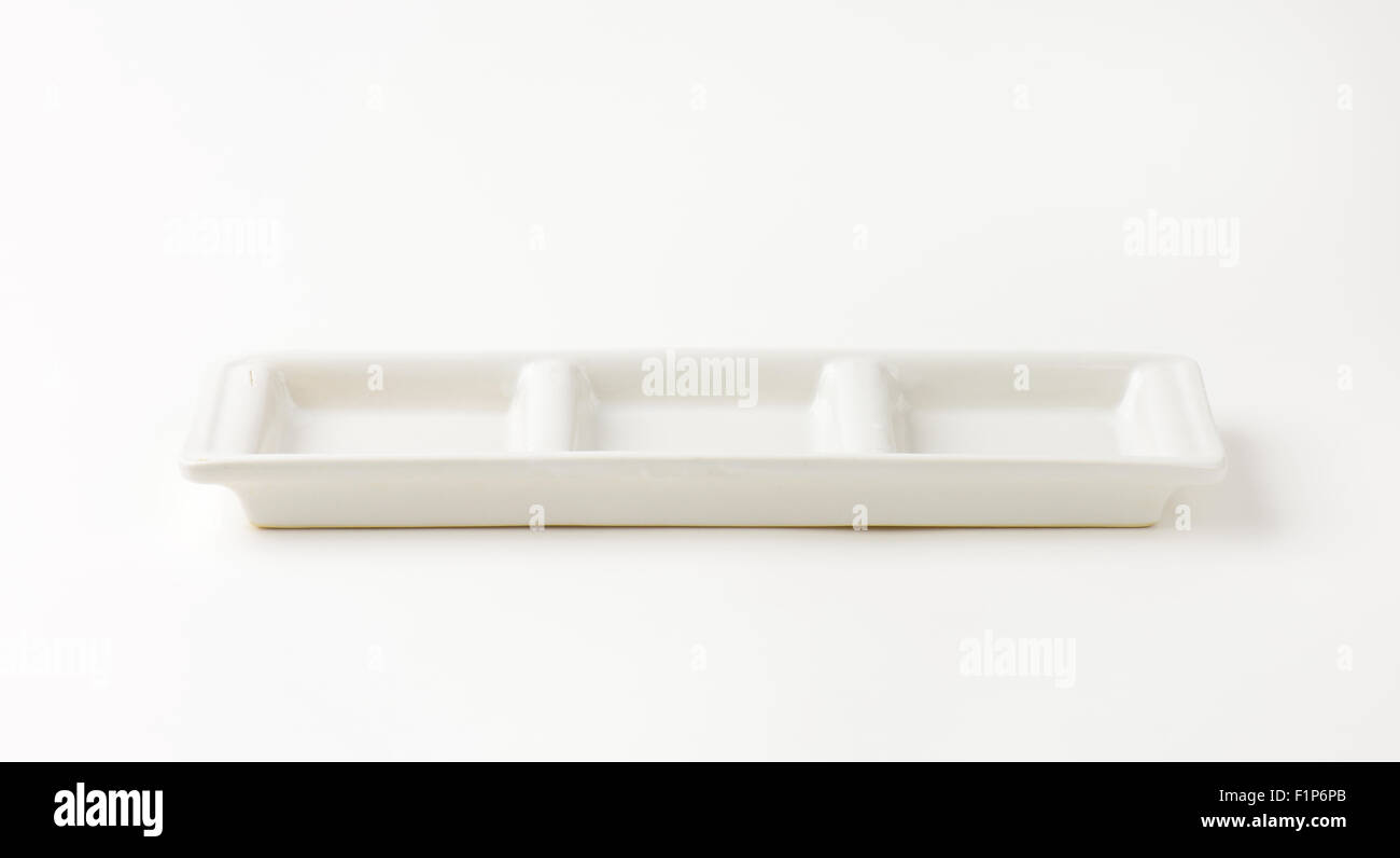 empty white tray on white background Stock Photo - Alamy