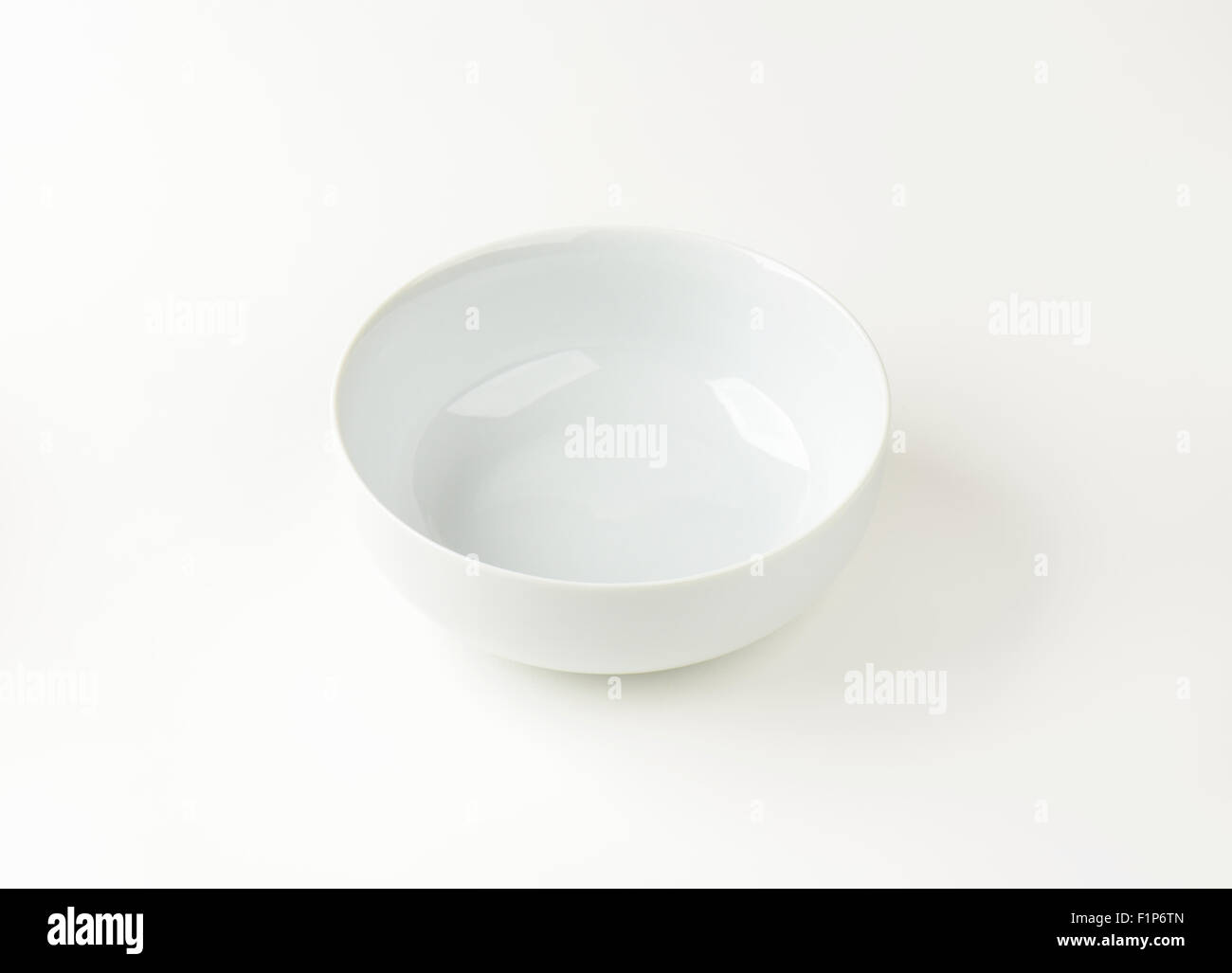 empty white bowl on white background Stock Photo - Alamy