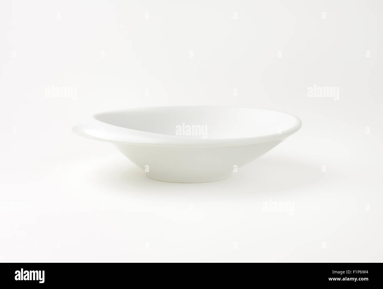 empty white bowl on white background Stock Photo - Alamy