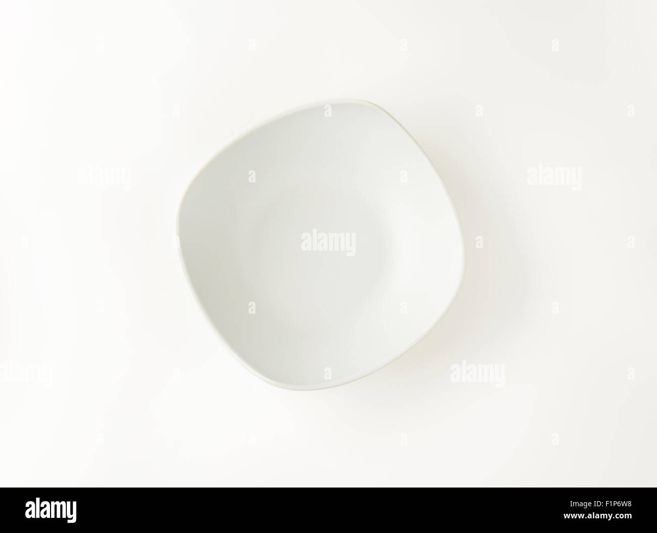 empty white bowl on white background Stock Photo - Alamy