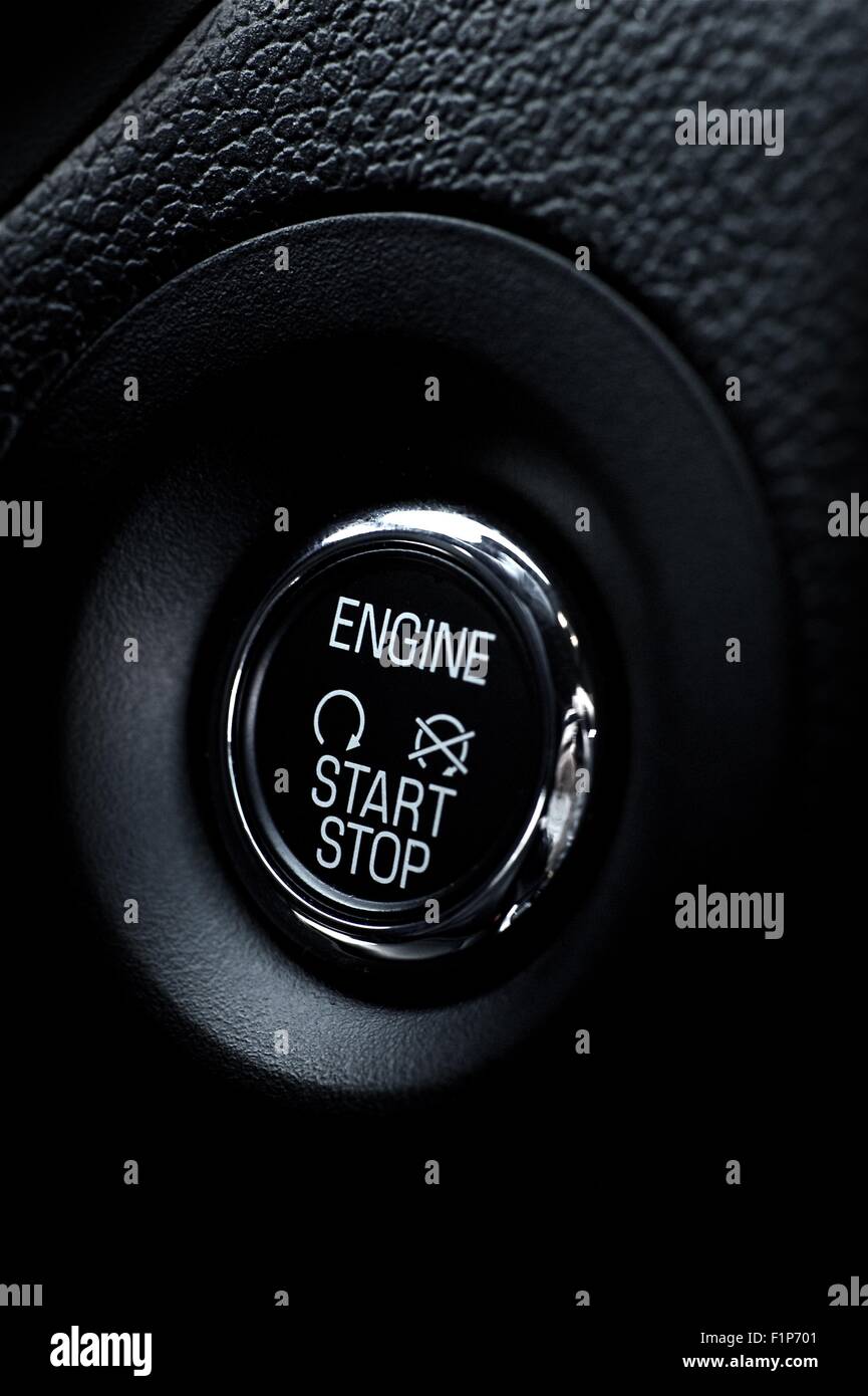 Black Engine Start Button in Modern Vehicle. Close Shot. Chrome ...