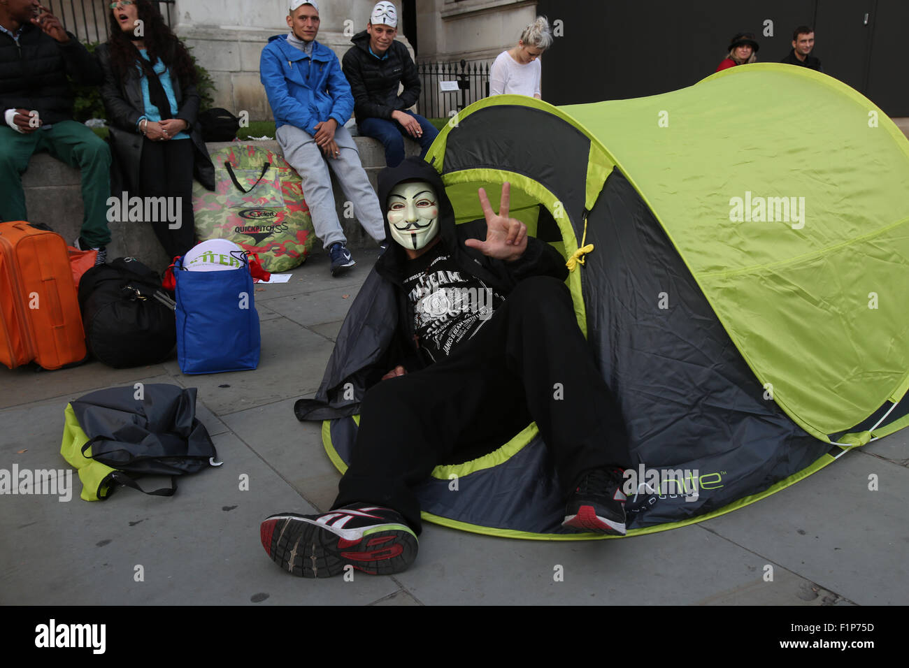 London, UK. 5th September, 2015. Homeless person pleased to recieve a ...