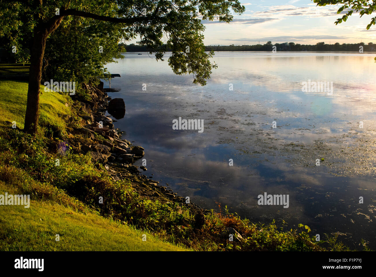 Reflections of sunset on the Ottawa River Stock Photo - Alamy