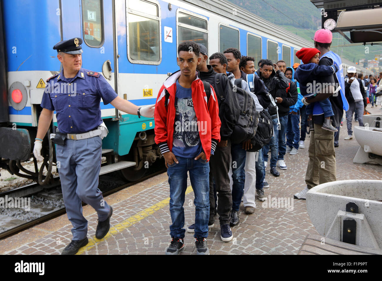 Migrants from Eritrea arrived on a train from Rome at Bolzano railway ...