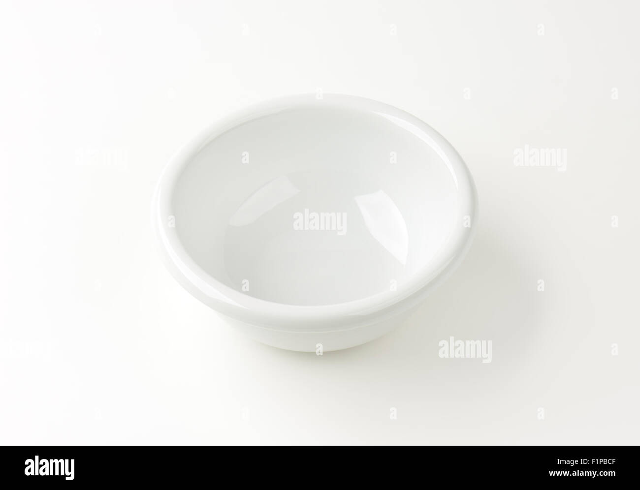 empty white bowl on white background Stock Photo - Alamy