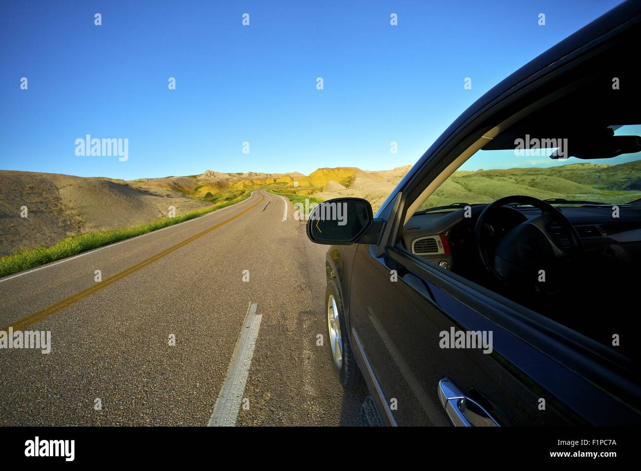 Badlands Drive Thru. Traveling Theme with Black SUV on the Loop Road in ...