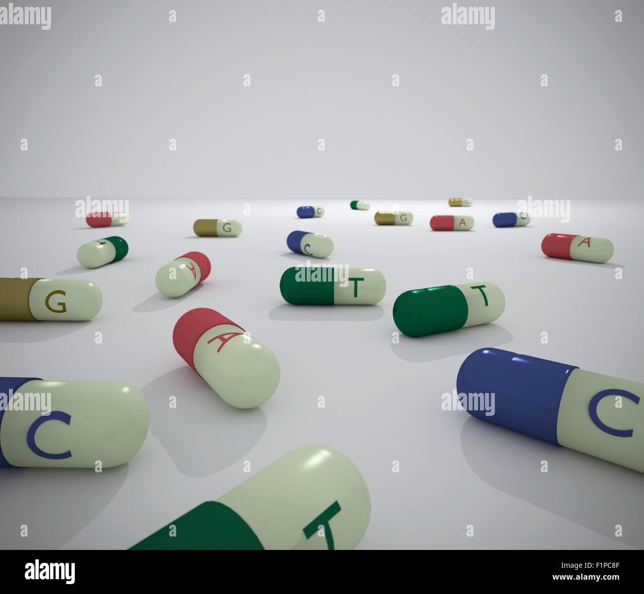 Capsules colour coded and labelled with the four bases of DNA Stock ...