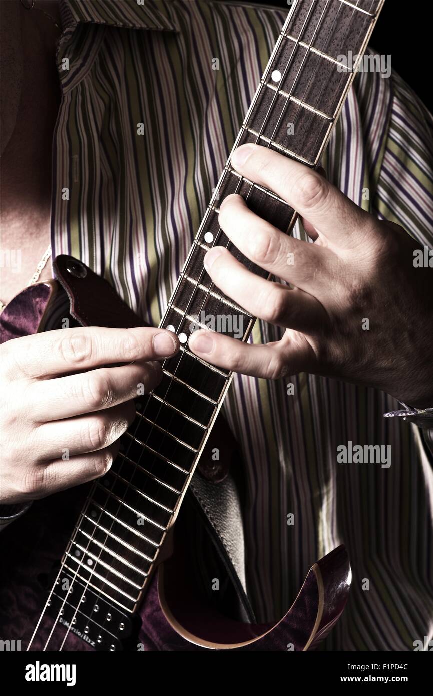 Guitar Player. Male Playing Guitar. Vertical Photography. Music Theme ...