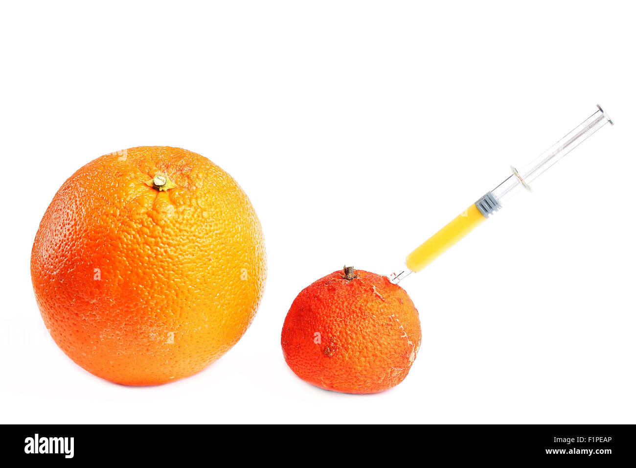 Isolated orange injection Stock Photo - Alamy