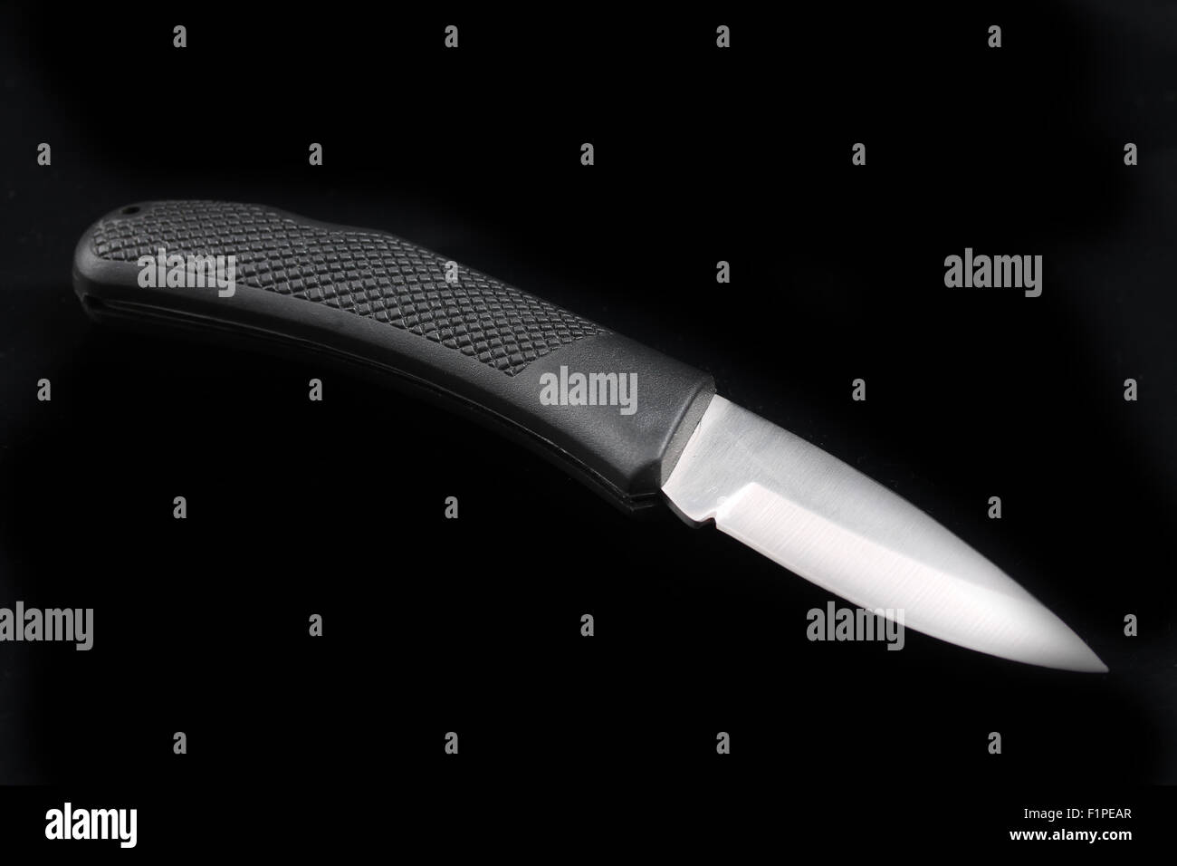 Isolated knife on black background Stock Photo - Alamy