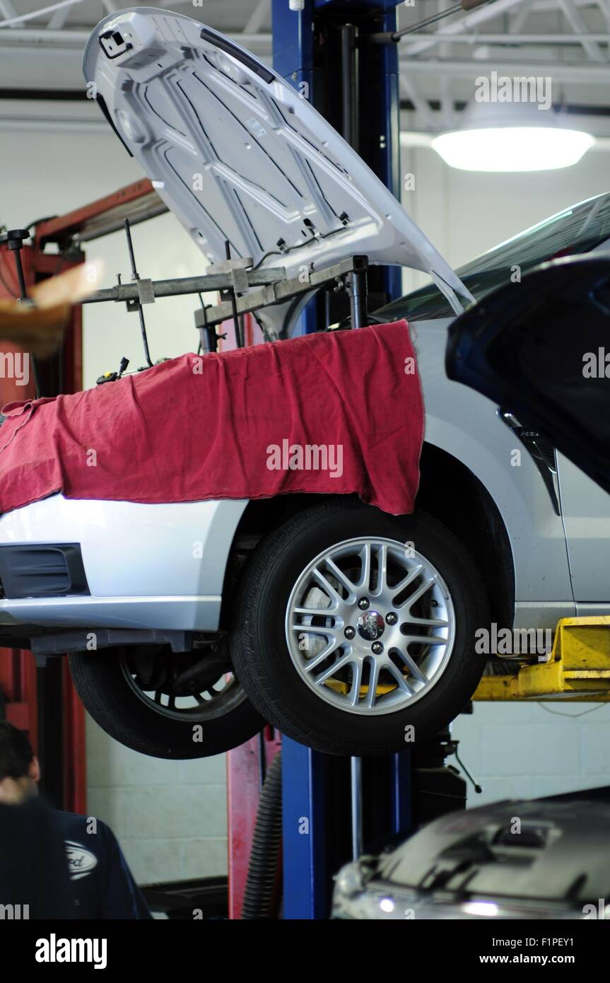 Auto Service. Repairing Vehicle in the Auto Service. Vertical Photo ...