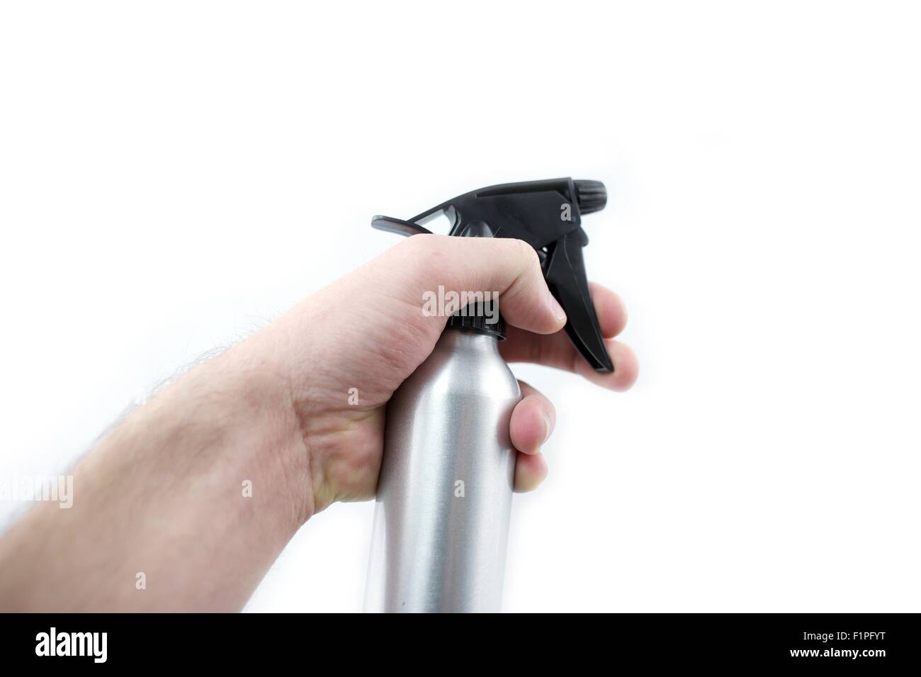 Spraying Bottle in Hand. Isolated on White Stock Photo - Alamy
