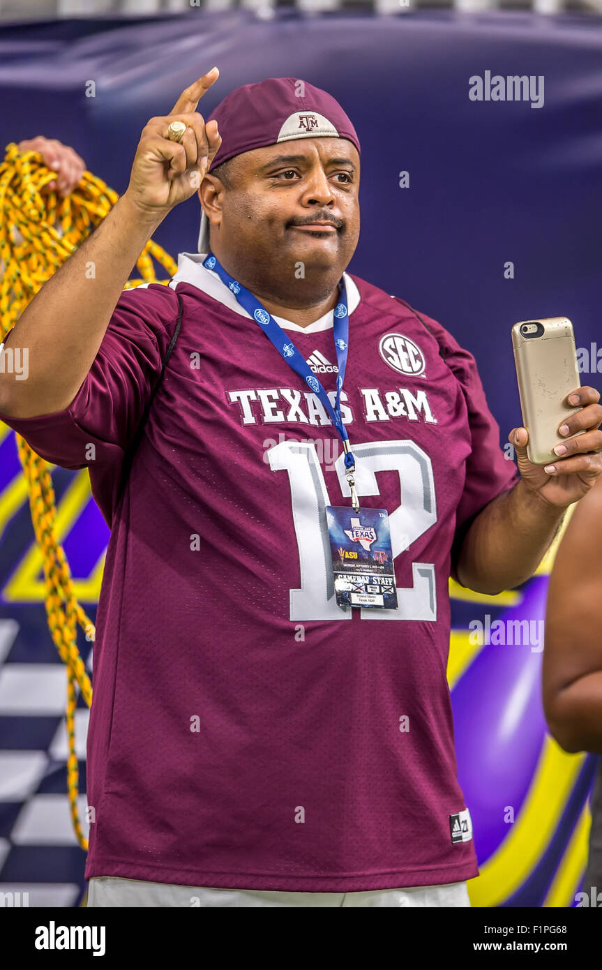 September 5, 2015 - Talk show host Roland Martin roots his team during ...
