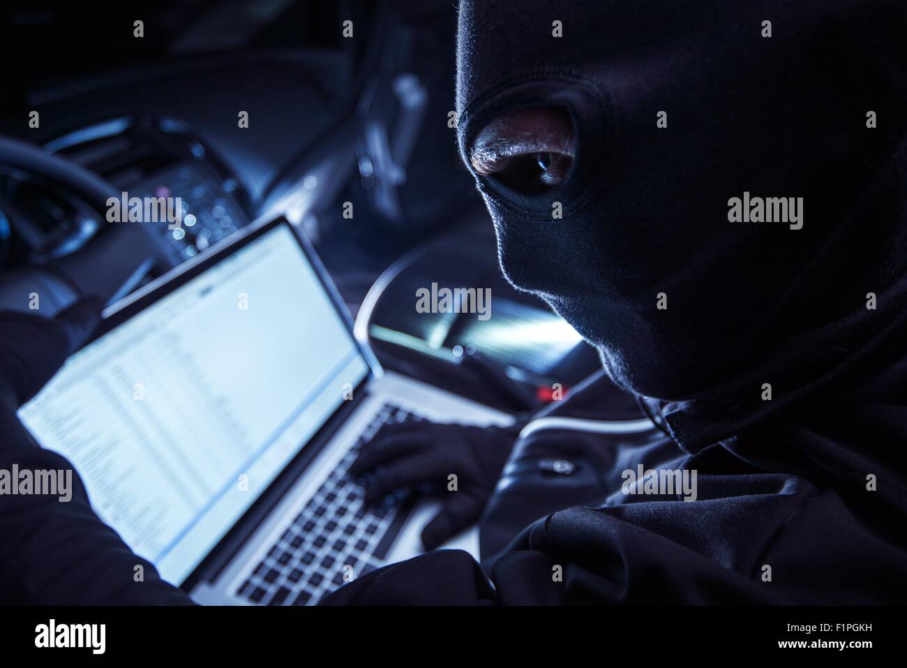 Hacker Inside the Car. Car Robber Hacking Vehicle From Inside Using His ...