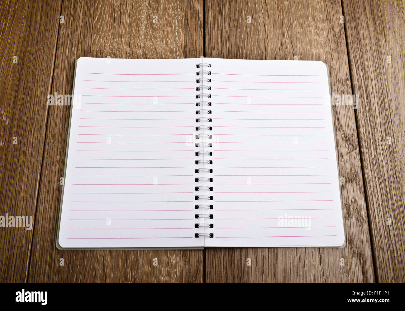 Notebook paper. Blank white page over wooden background Stock Photo - Alamy