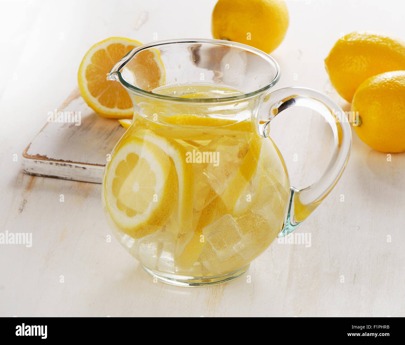 Glass jug with lemon hi-res stock photography and images - Alamy
